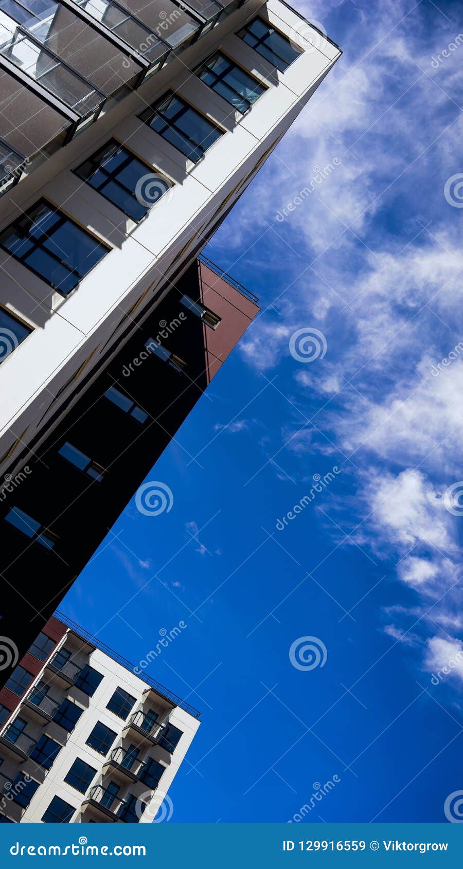 New High-rise Buildings Against the Sky Stock Image - Image of clouds ...