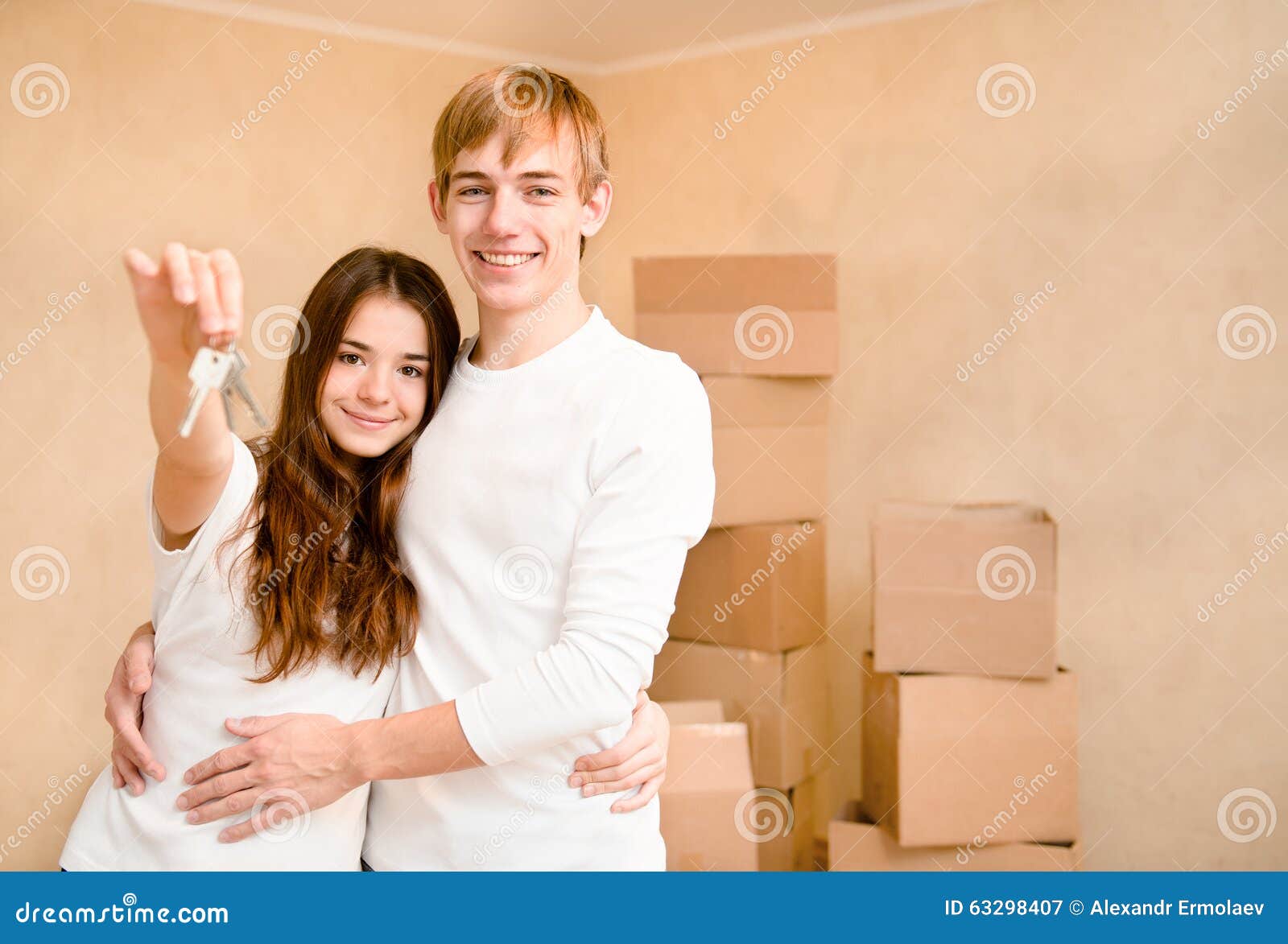 New home owners with key stock image. Image of apartment - 63298407