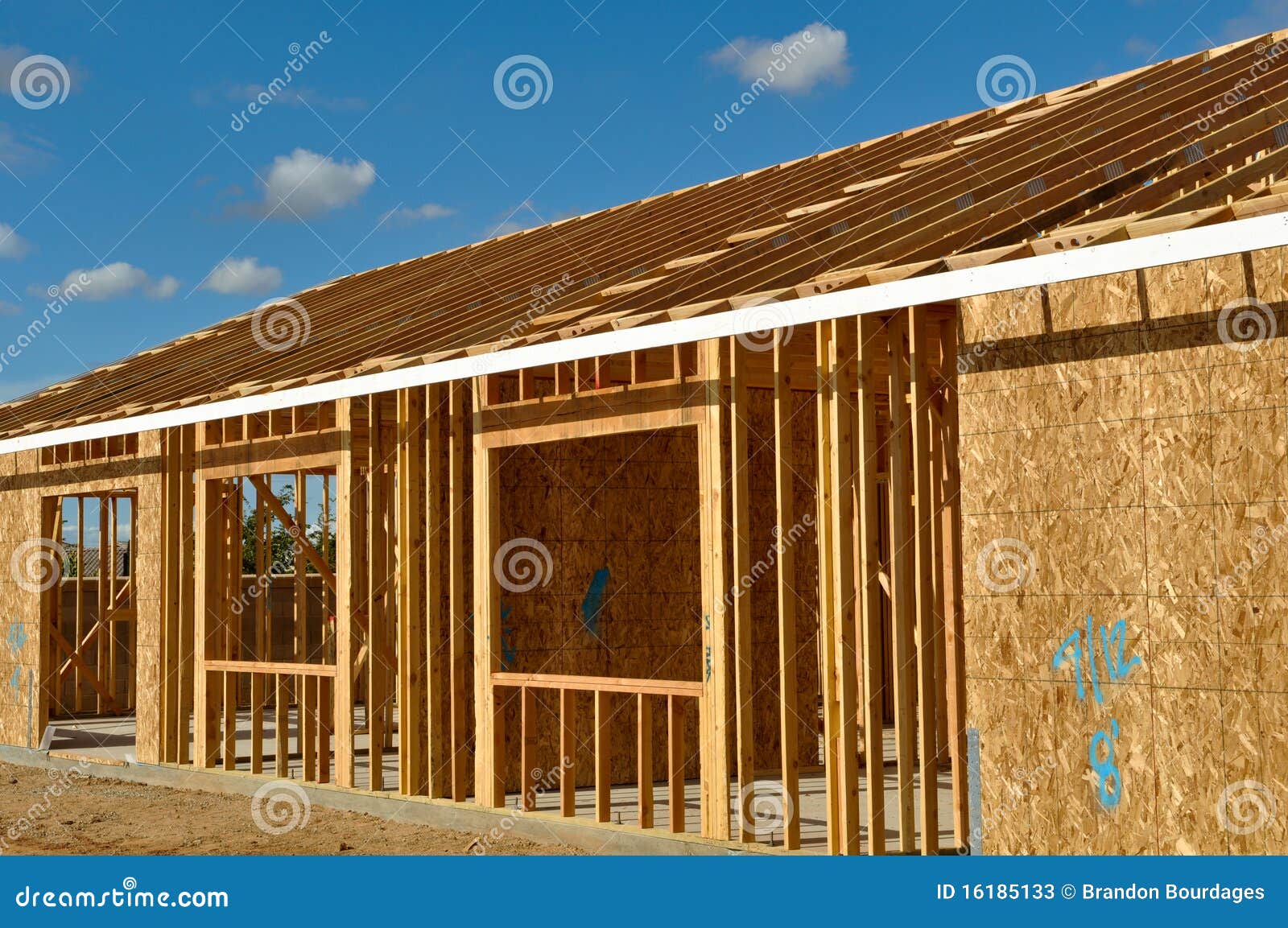 New Home Under Construction Stock Image - Image of feet, dwelling: 16185133