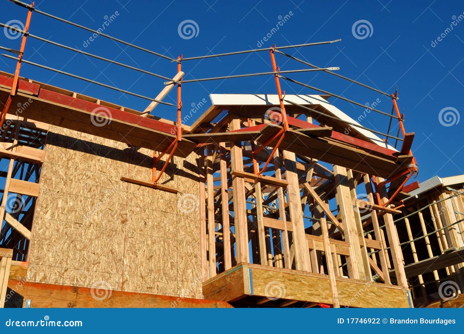 New Home Under Construction Stock Photo - Image of scaffolding, frame ...