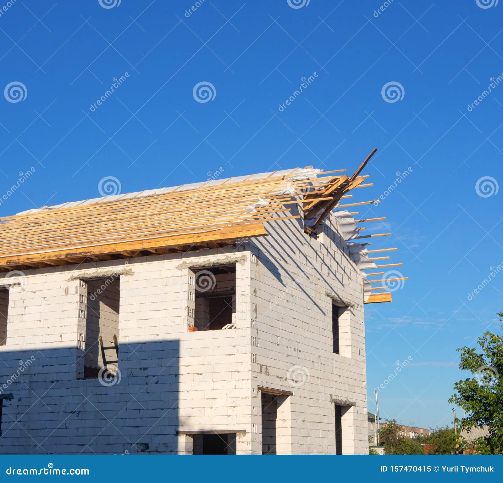 New House Under Construction with Missing Windows and Unfinished Roof ...