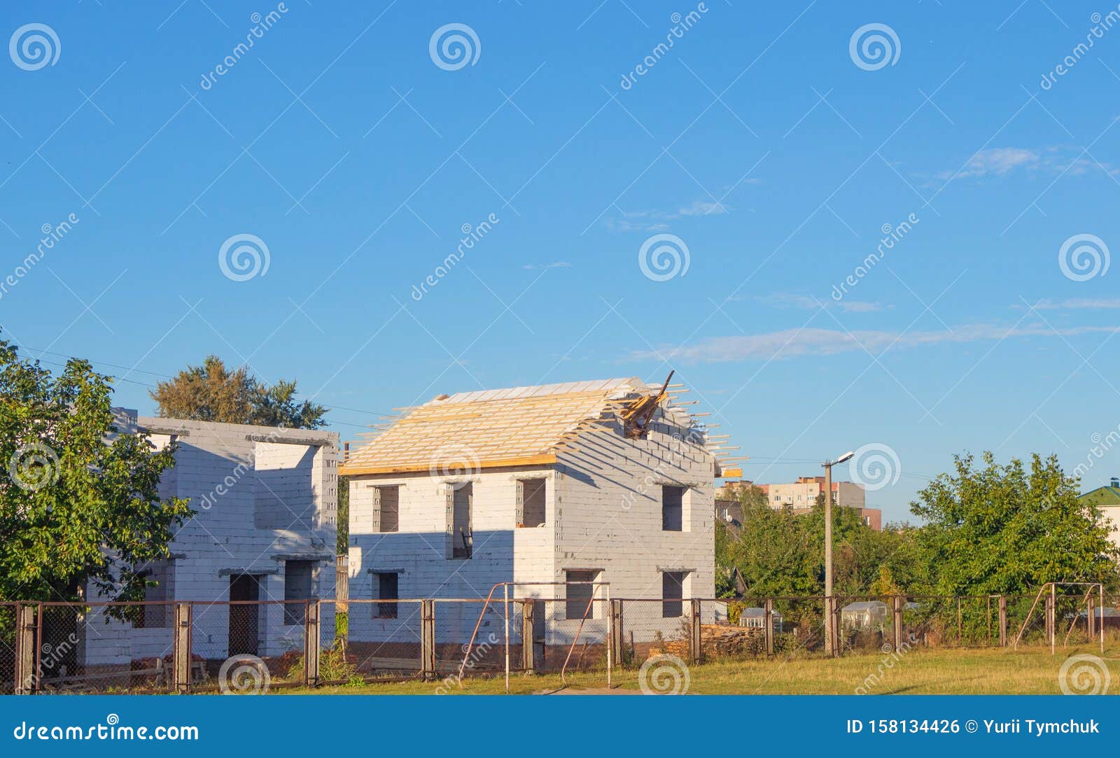 New House Under Construction with Missing Windows and Unfinished Roof ...