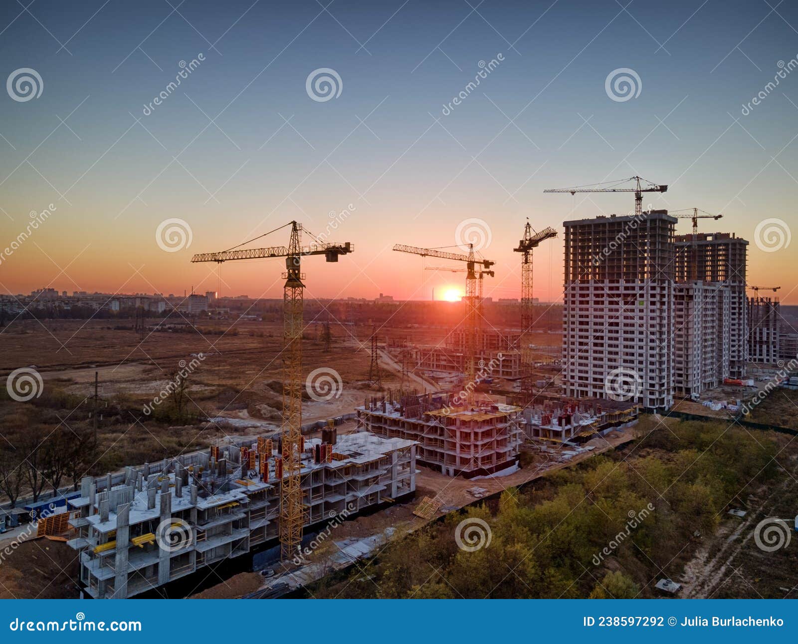New Houses Construction Site at Sunset Stock Photo - Image of houses ...