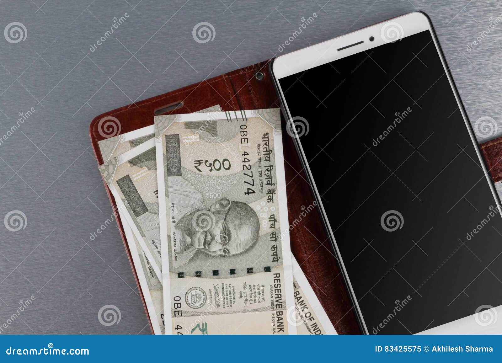 New Indian Rupee 500 Currency Note and Mobile Banking Stock Image ...