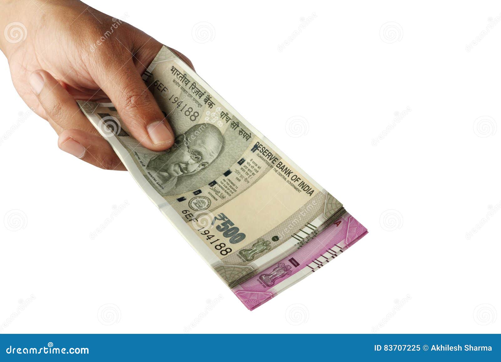 New Indian Rupee Currency Notes in a Hand on White Stock Image - Image ...