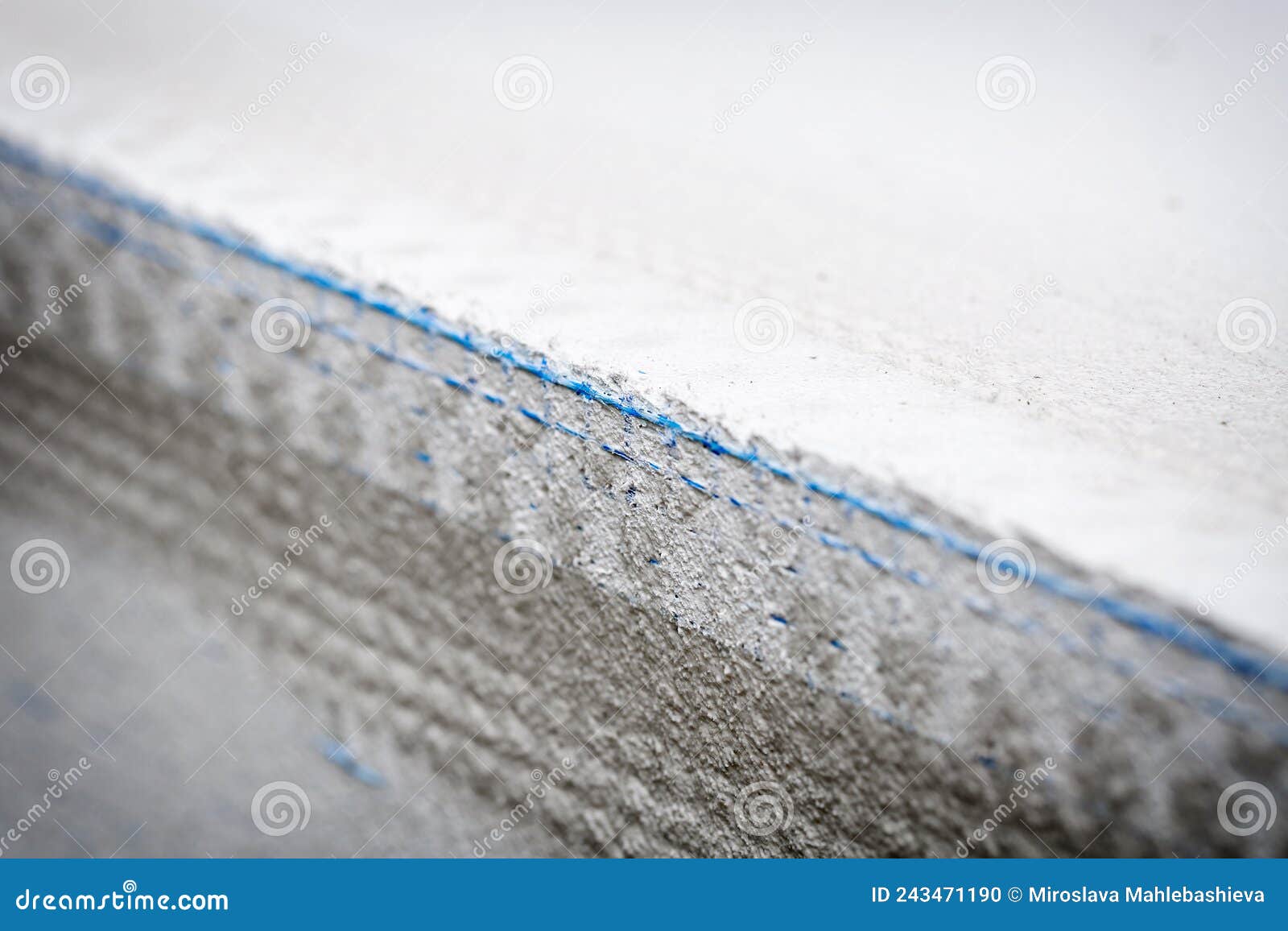 New Installed Plastering Angle Bead with Blue Plastic Mesh on the ...