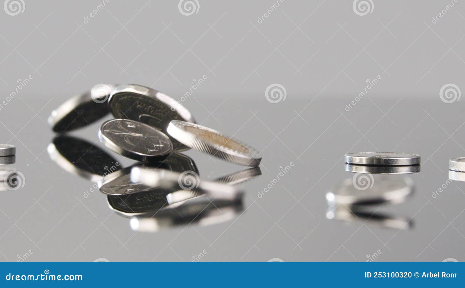 New Israeli Shekels Coins Falling in Slow Motion on a Reflective ...