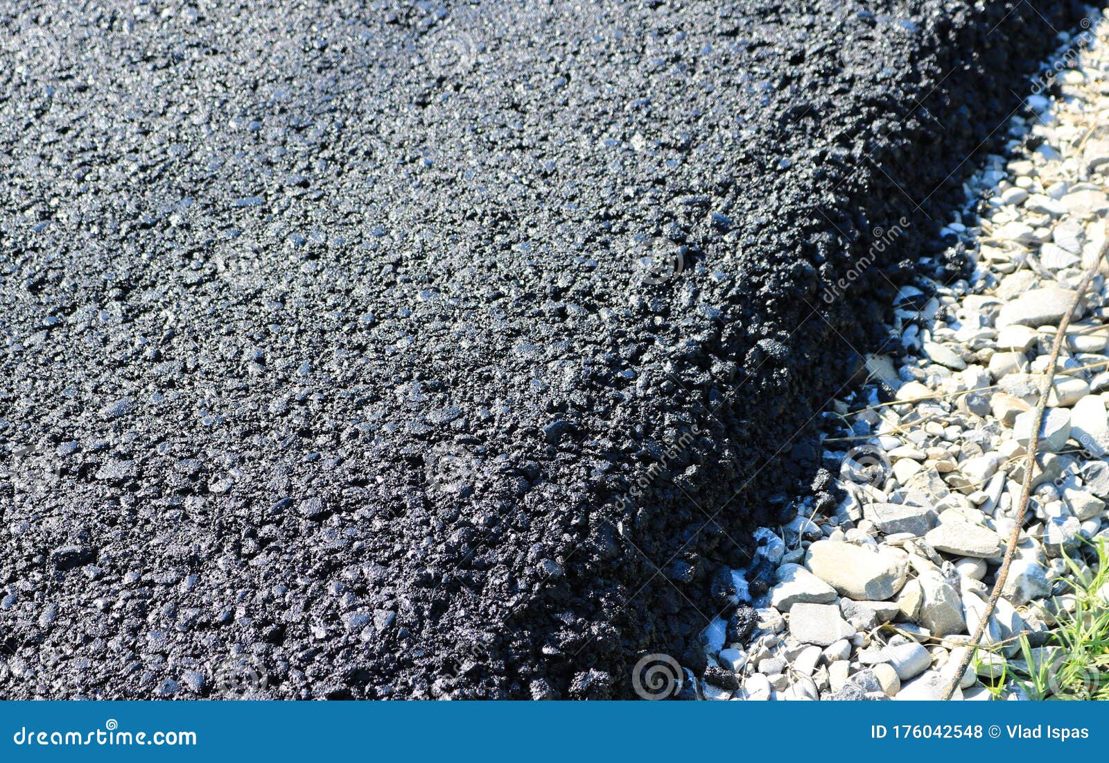 New Layer of Asphalt Road Under Construction with Support from the ...