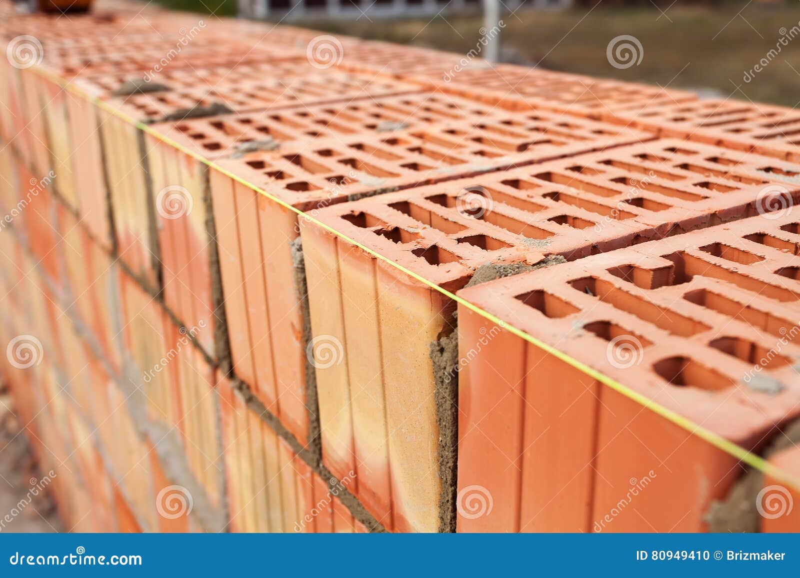 New Laying Bricks with a Guideline Stock Photo - Image of bricklaying ...
