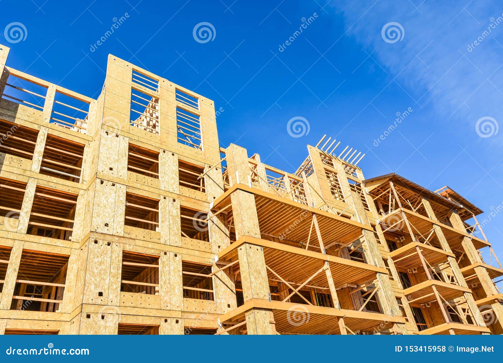 New Low Rise Building Under Construction on Blue Sky Background on ...