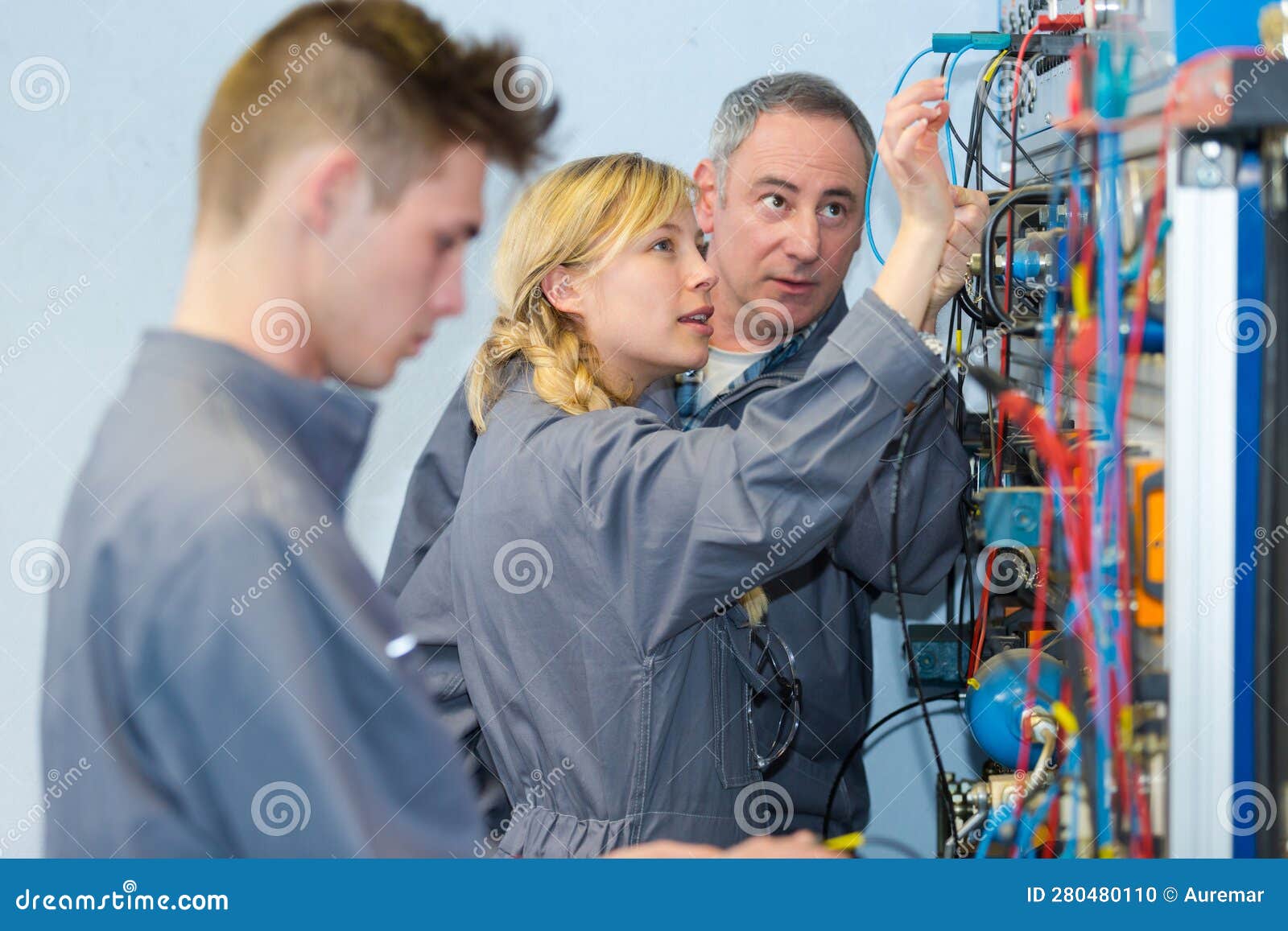 New Maintenance Team Recruits Fixing Cables Stock Photo - Image of ...