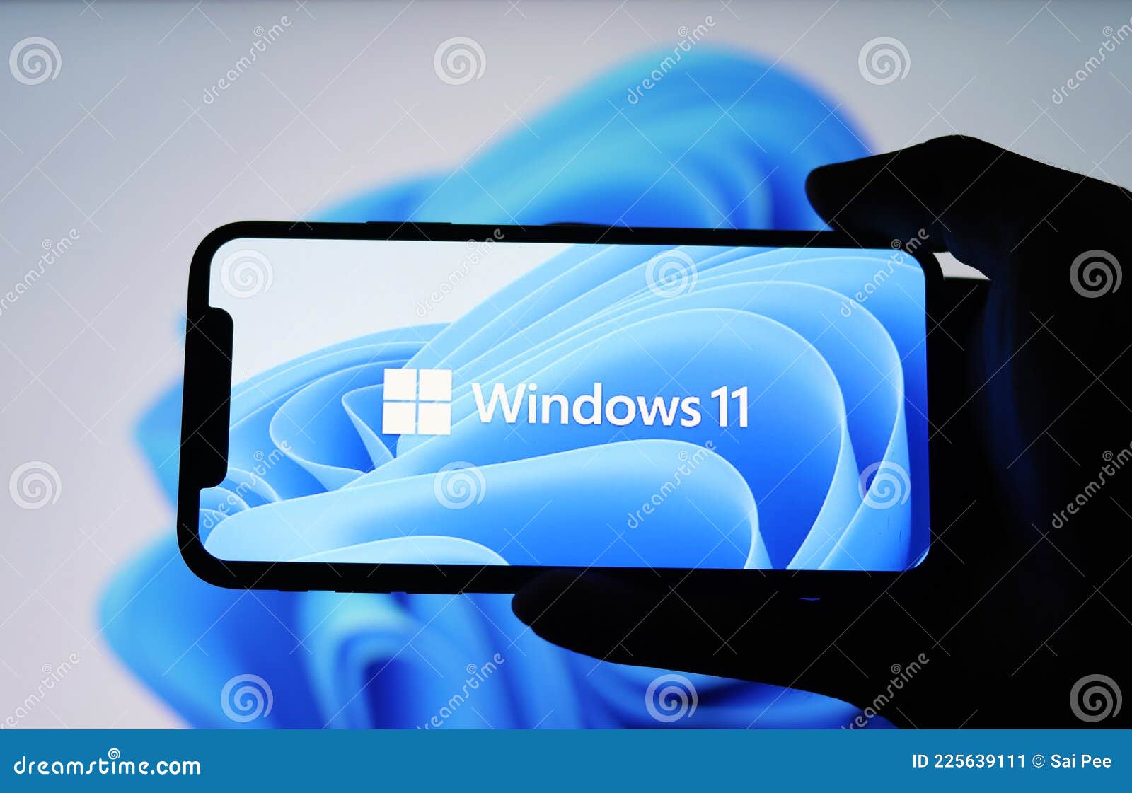 New Microsoft Windows 11 on Computer Screen and Windows 11 Logo on ...