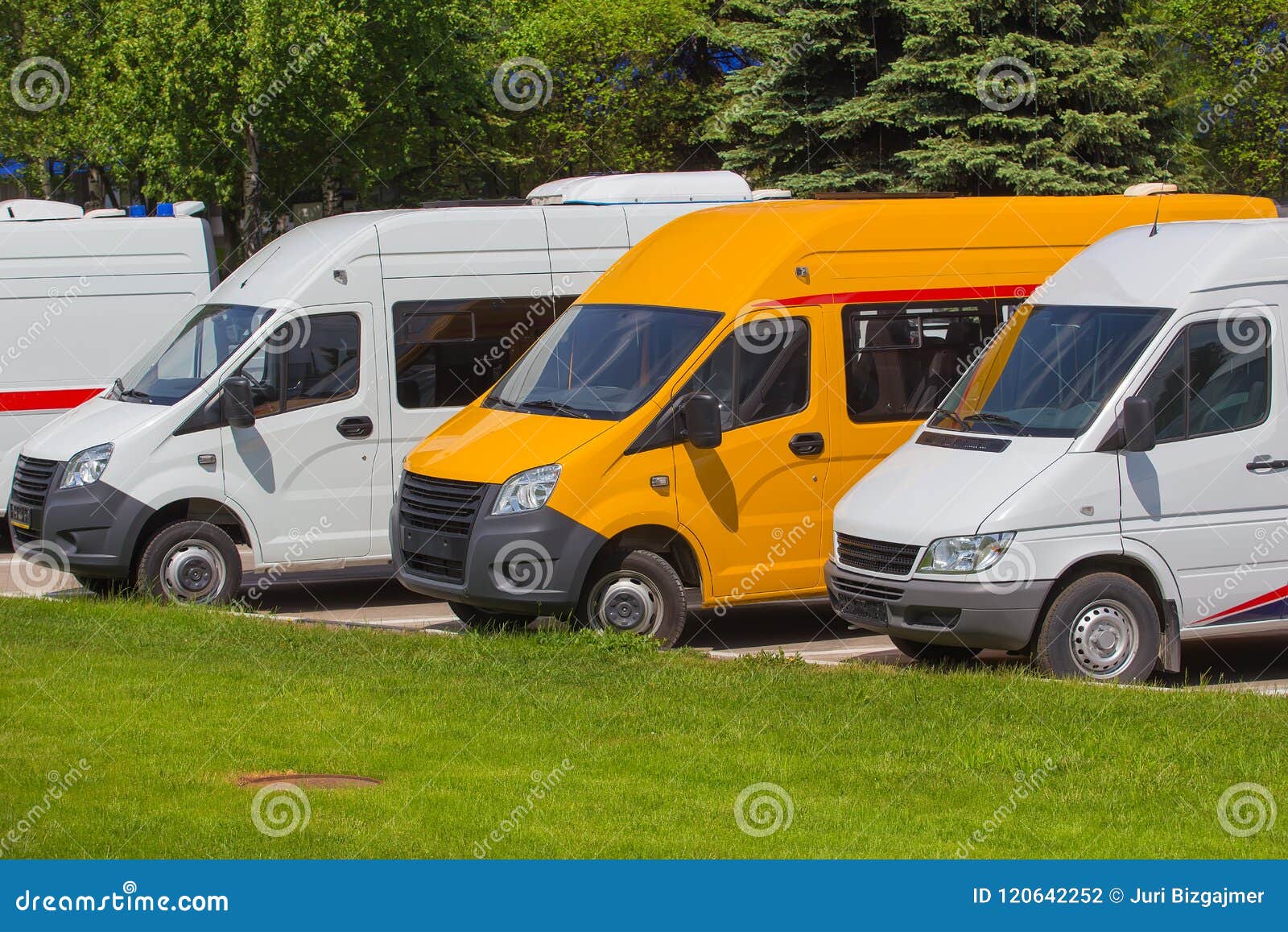 Mini Buses in the Parking Lot Stock Photo - Image of stand, vehicle ...