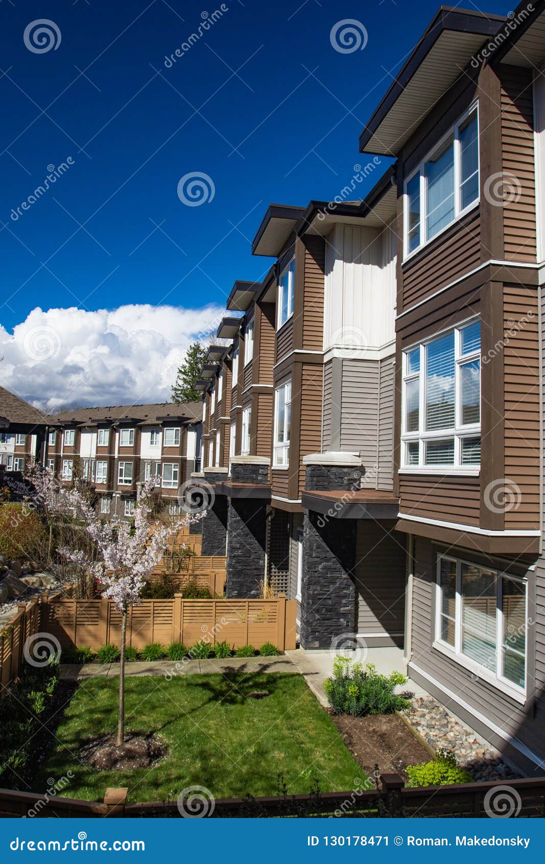New Modern Low Rise Apartment Complex on a Sunny Spring Day with ...