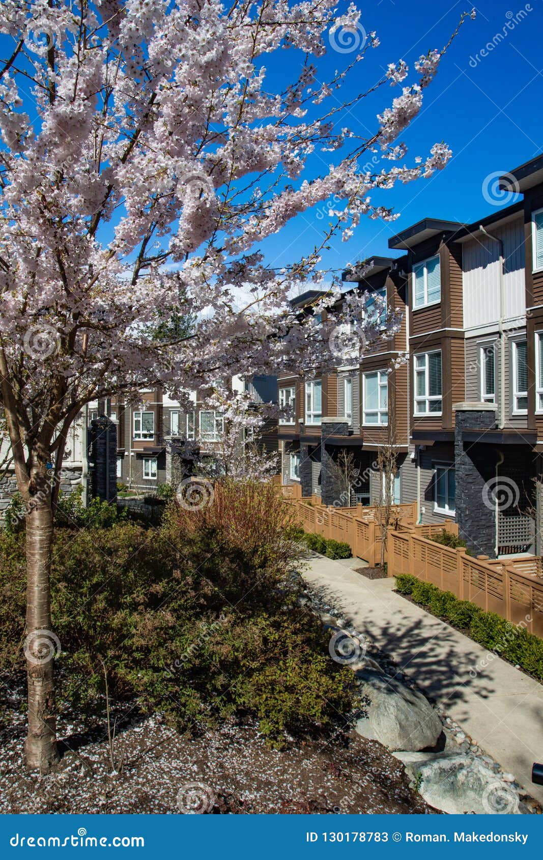 New Modern Low Rise Apartment Complex on a Sunny Spring Day with ...