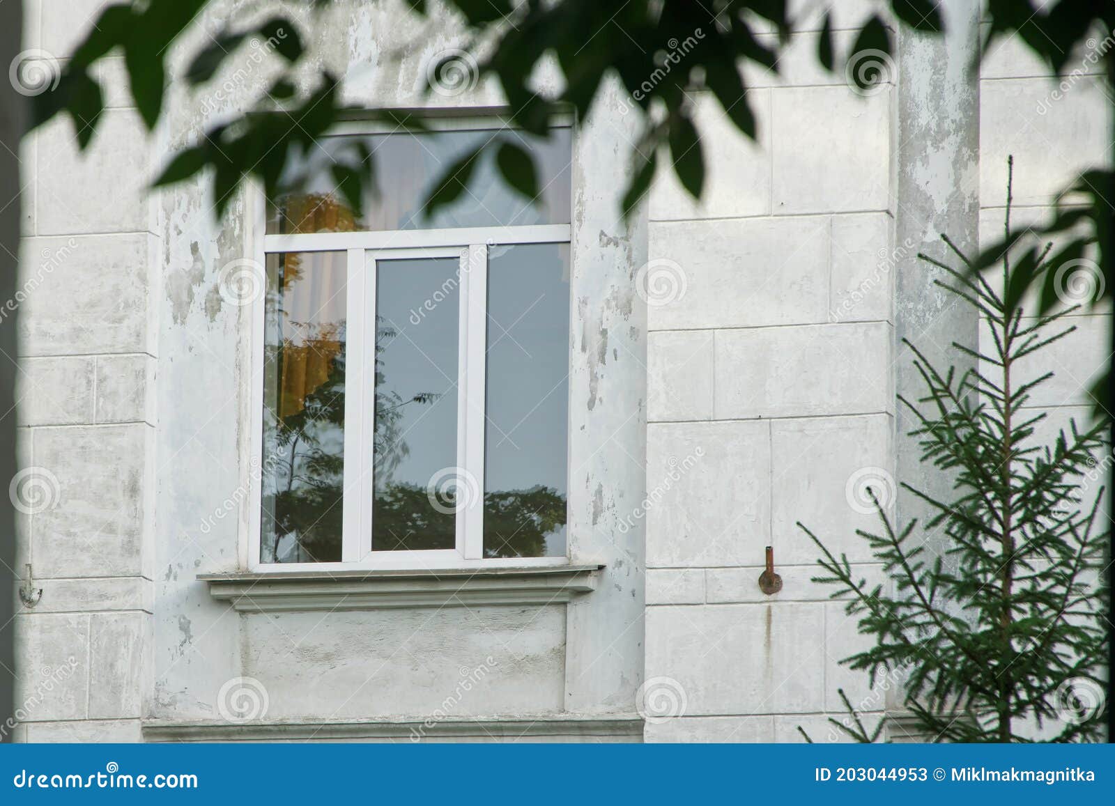 New Modern Multi-pack Plastic Window Frame Installed in an Old Shabby ...