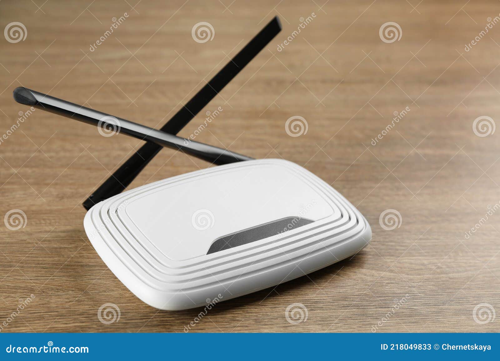 New Modern Wi-Fi Router on Wooden Background Stock Image - Image of ...