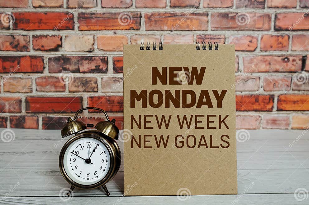 New Monday New Week New Goals Text Message with Alarm Clock on Wooden ...