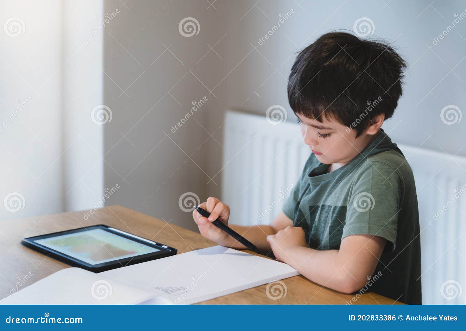 New Normal Life Kid Using Tablet for His Homework,Child Boy Doing ...