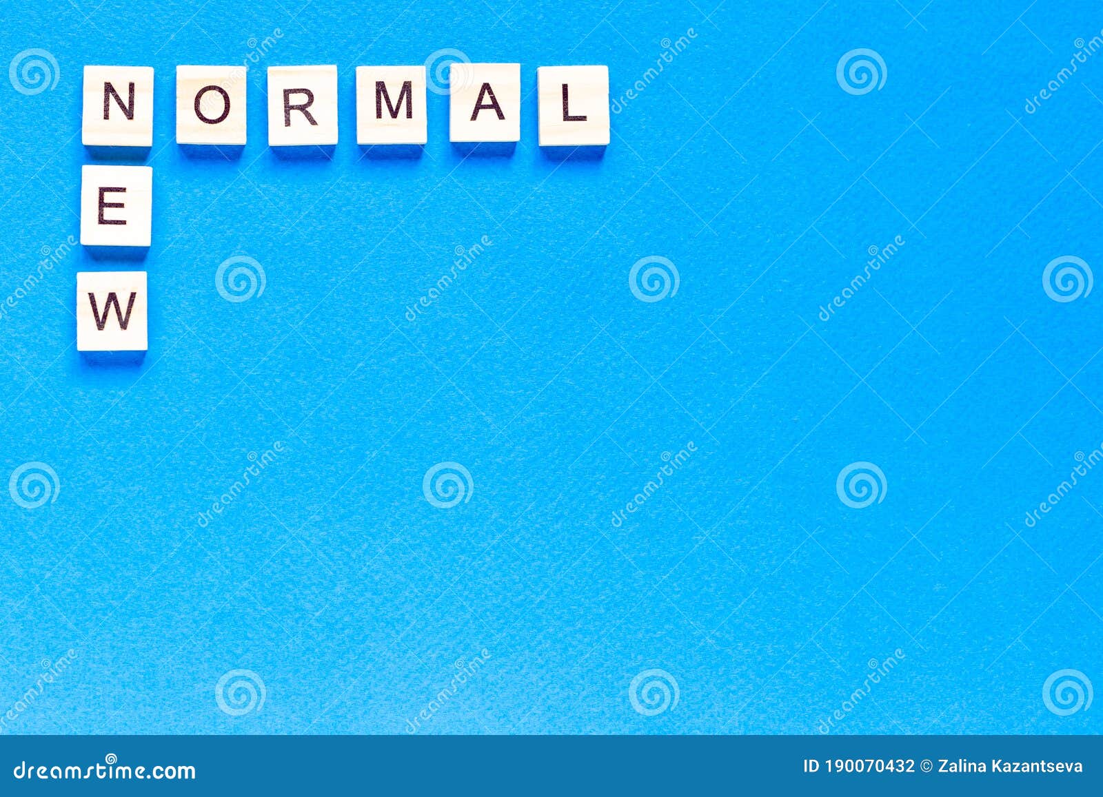 NEW NORMAL Word on Wooden Alphabet Cube. New Normal Concept. Top View ...