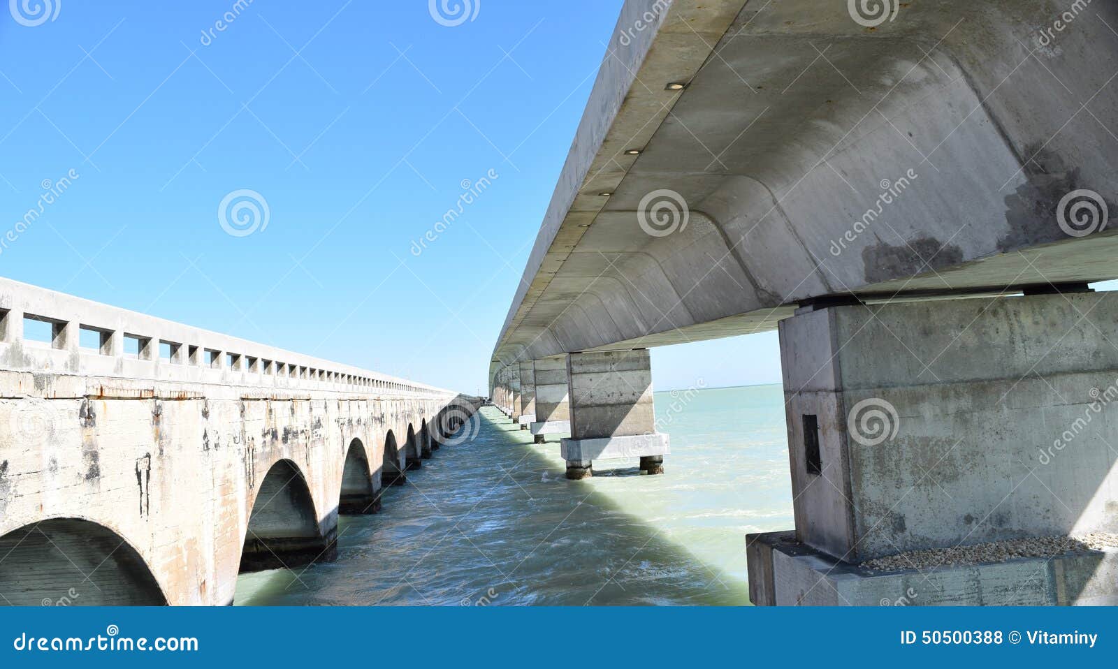 New and Old Bridge and Power Poles Stock Photo - Image of bridge, dusk ...
