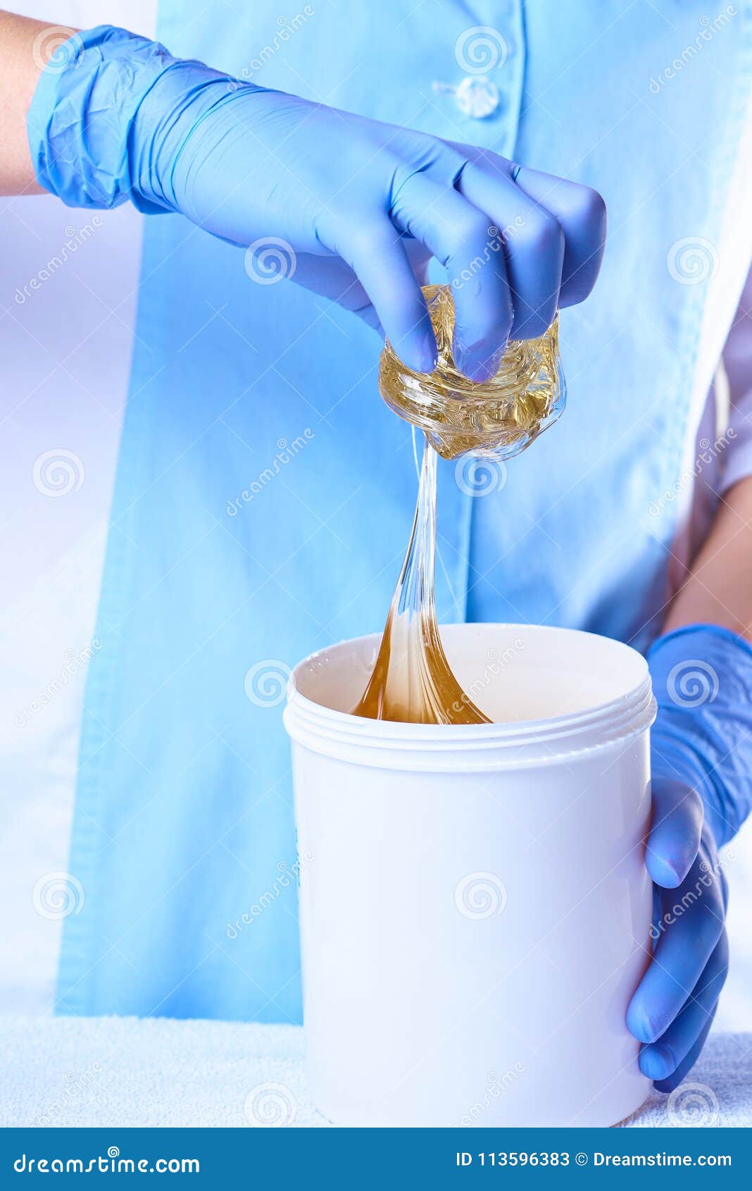 A New Pack of Sugaring Paste and a Piece of Golden Sugaring Paste in a ...