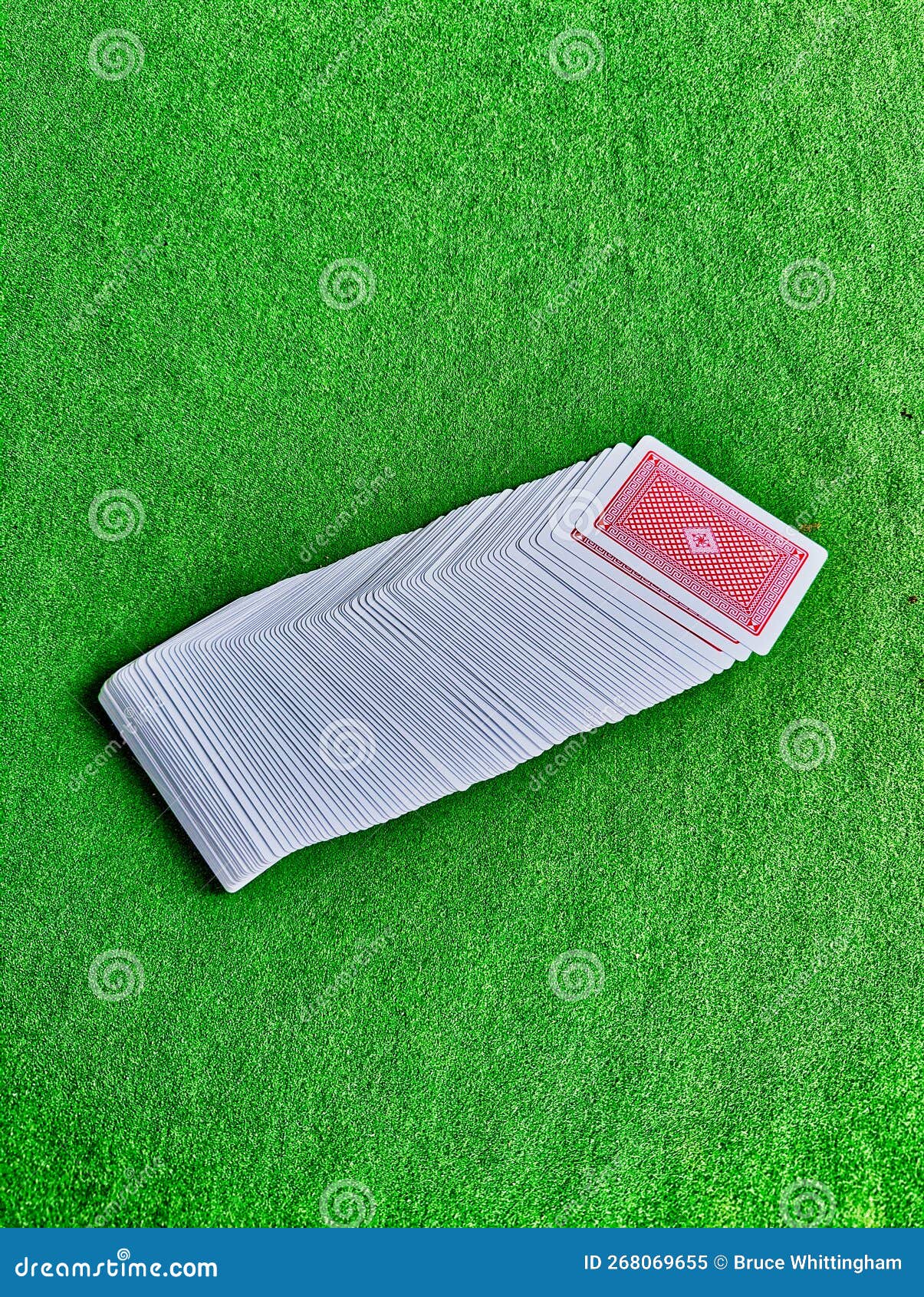 New Palying Card Deck Spread on Green Felt Card Table Stock Image ...