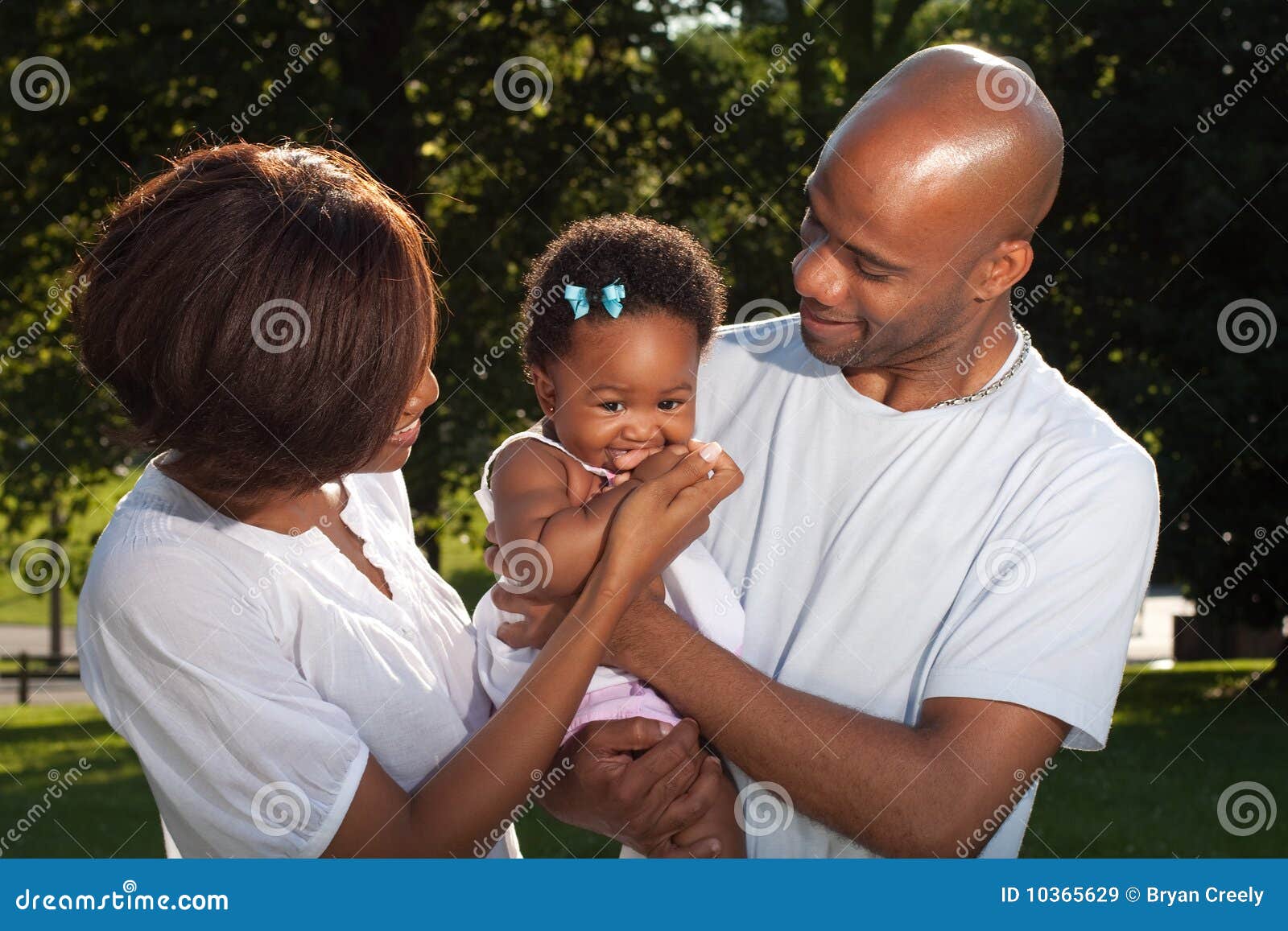 New parents stock image. Image of posing, father, infant - 10365629