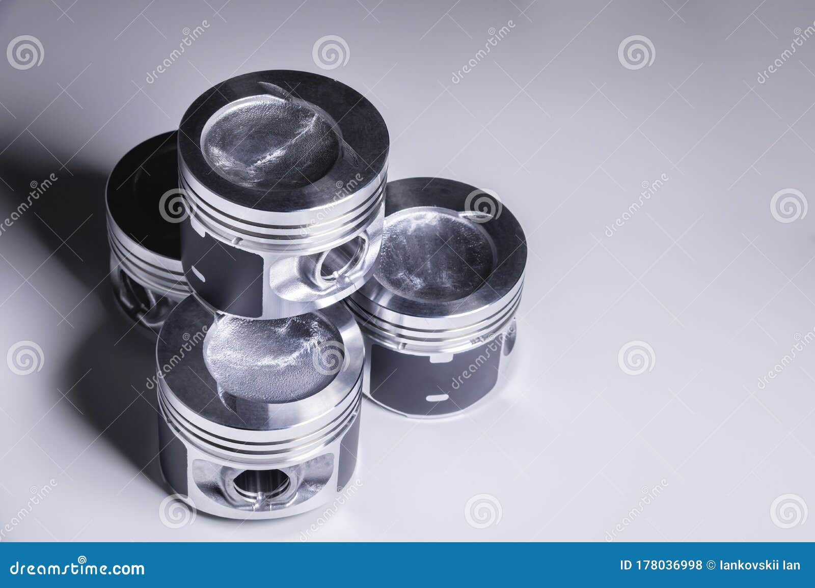 New Parts for the Internal Combustion Engine. Pistons on a Gray ...