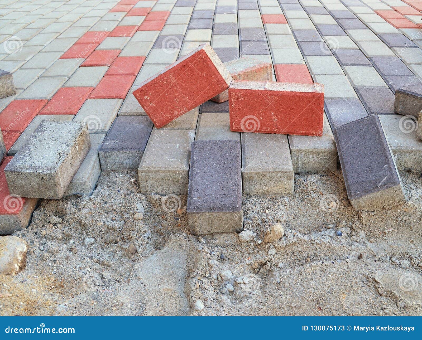 New Pavement Laying with Rectangular Paving Slabs of Gray, Blue and Red ...