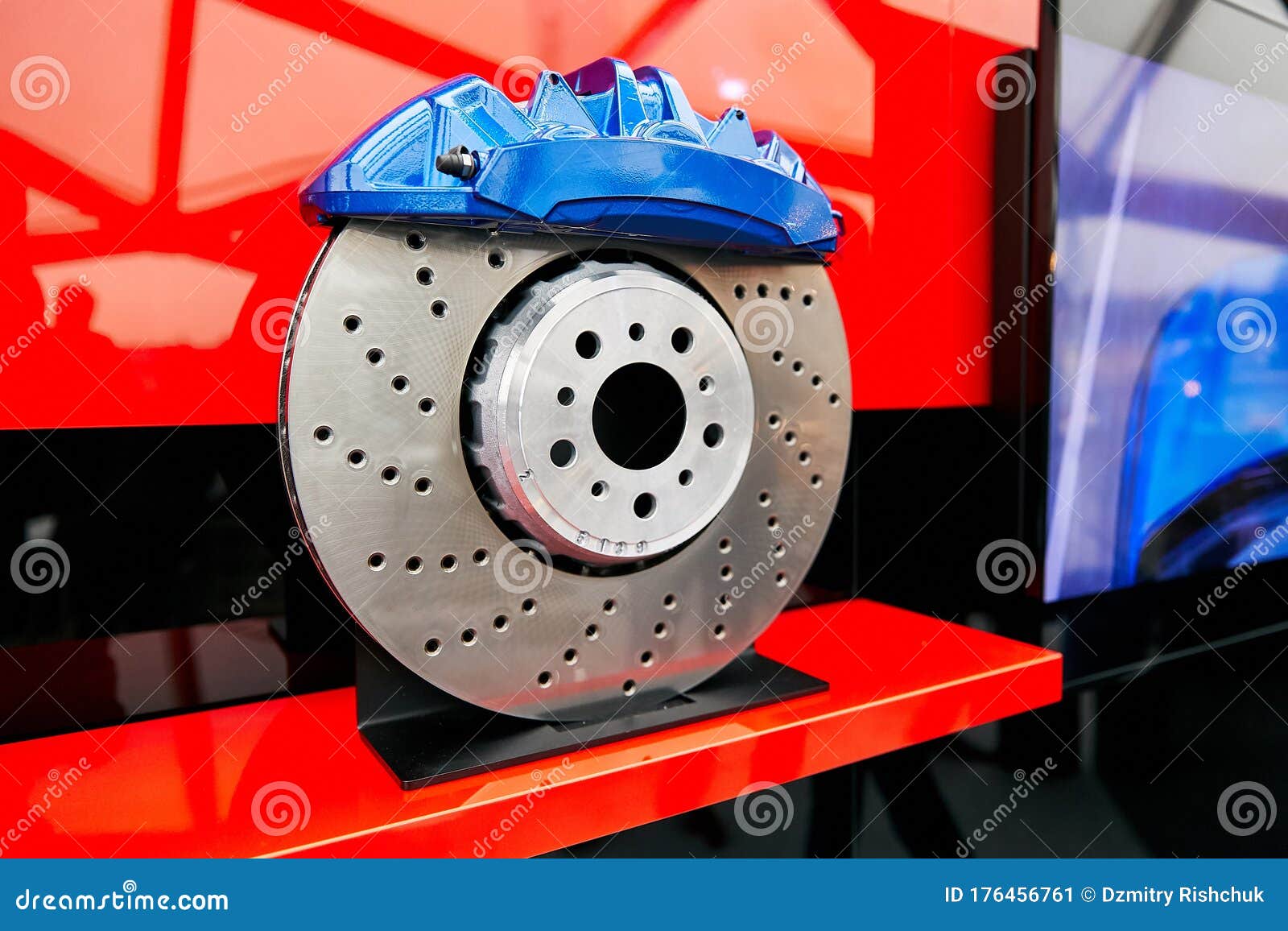 New Perforated Brake Disc and Blue Brake Caliper Stock Image - Image of ...