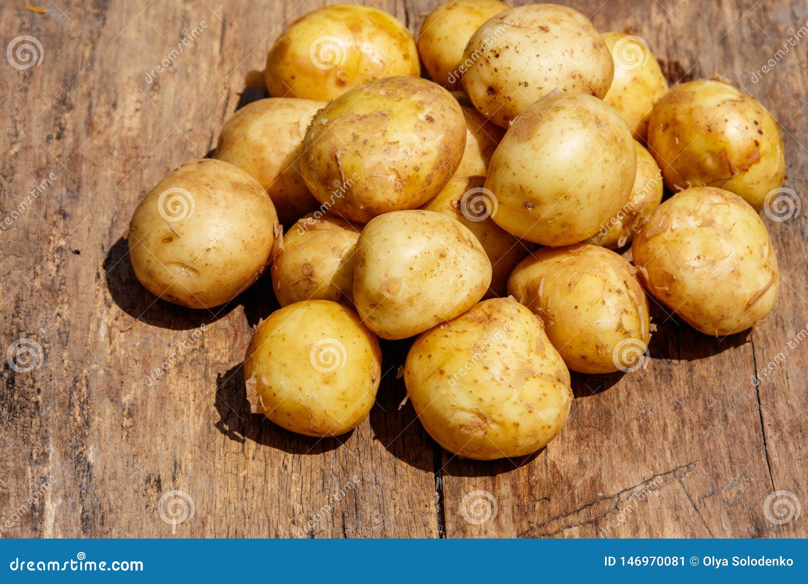 New Potatoes on Rustic Wooden Table Stock Image - Image of potato ...