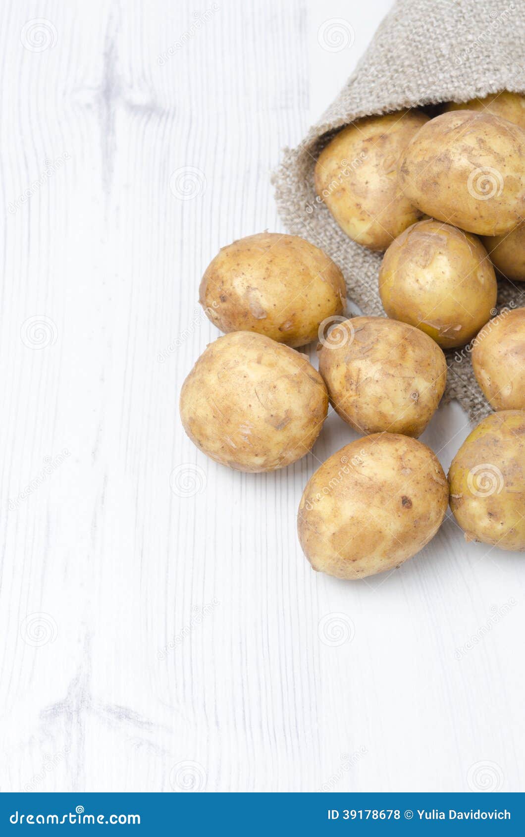 New Potatoes in a Sack, Vertical Stock Photo - Image of healthy, food ...