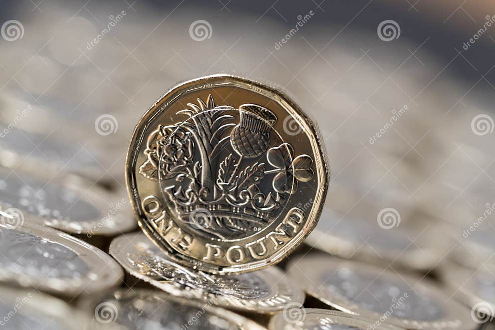 New Pound Coins Introduced in Britain in 2017 Editorial Stock Image ...