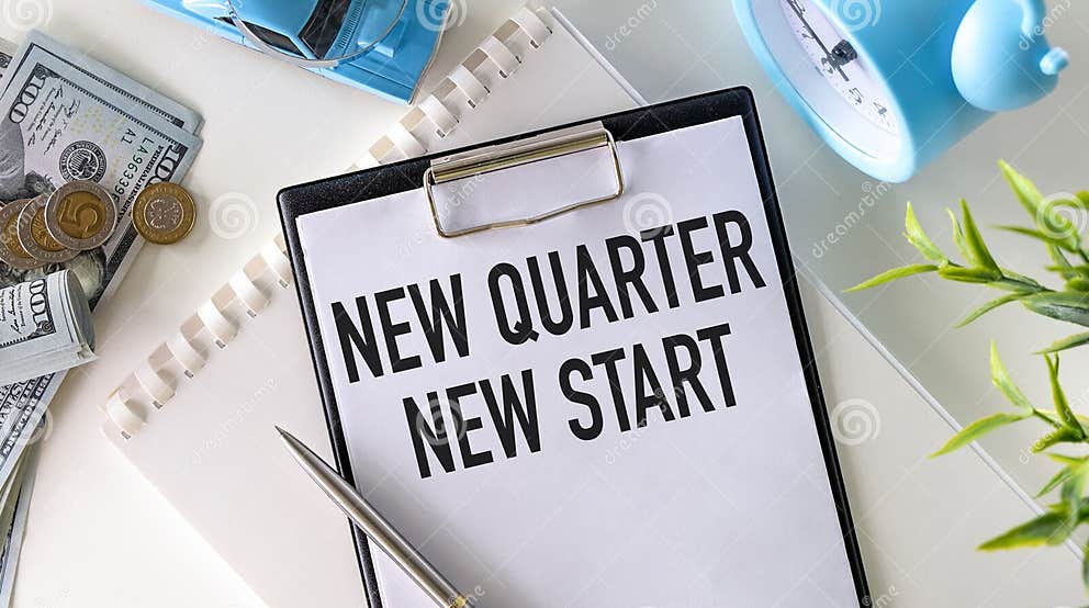NEW QUARTER NEW START Text Written on a Paper Clipboard with Office ...