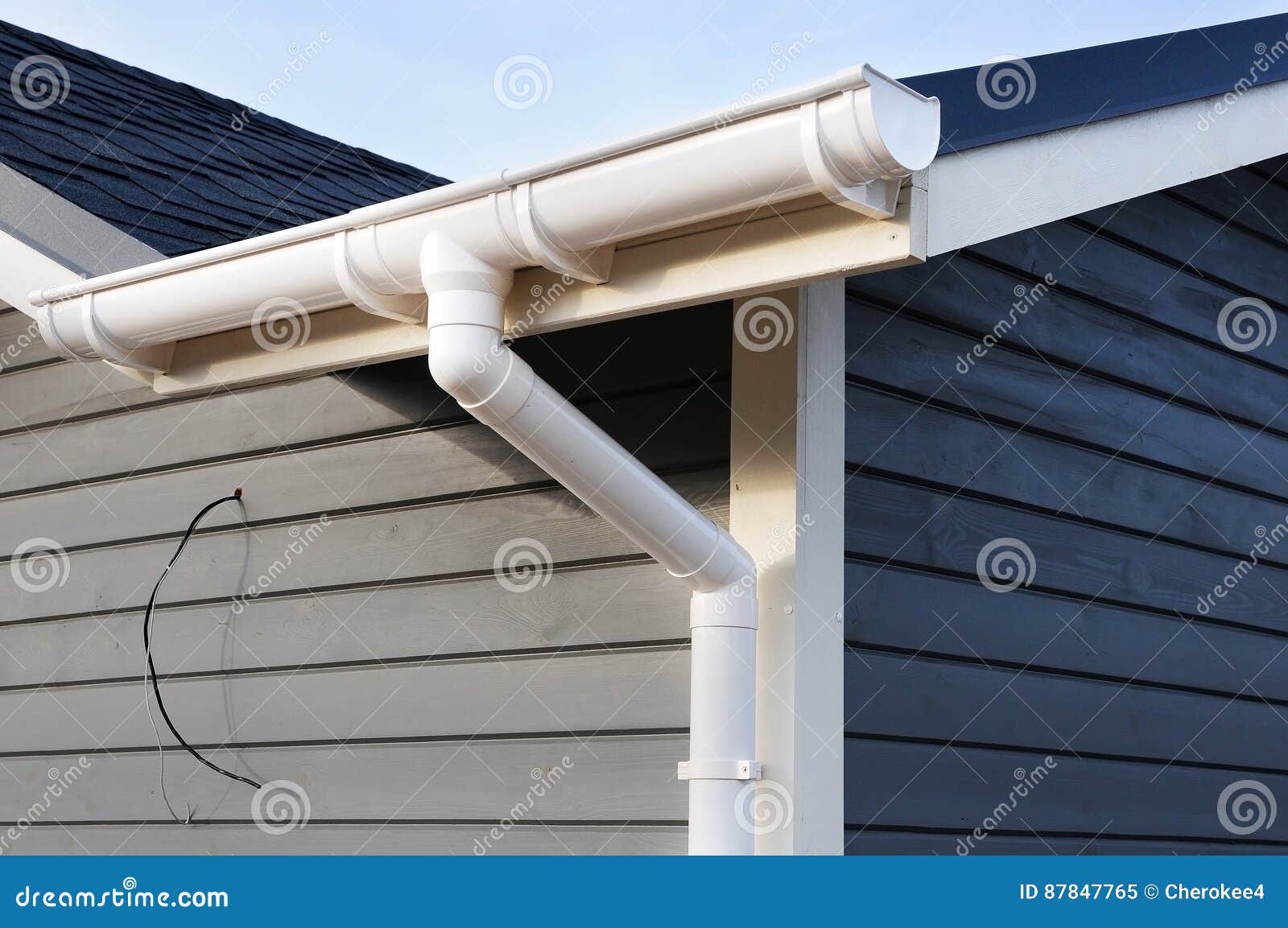New Rain Gutter on a Home Against Blue Sky. Stock Image - Image of flow ...