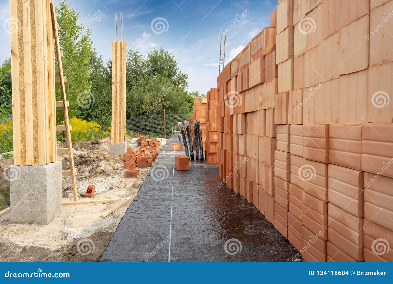 New Red Brick Wall with Mark of Level Height on Formwork Bituminous ...