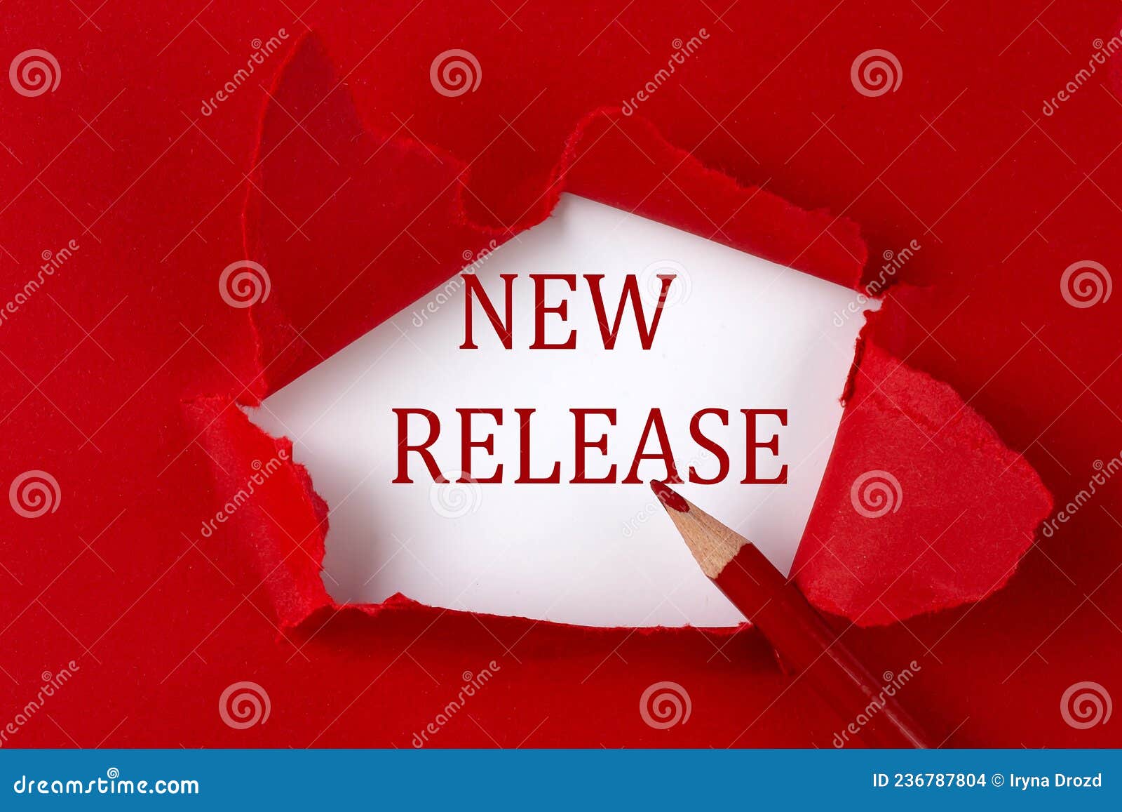 NEW RELEASE Text on the Red Torn Paper with Red Pencil Stock Photo ...