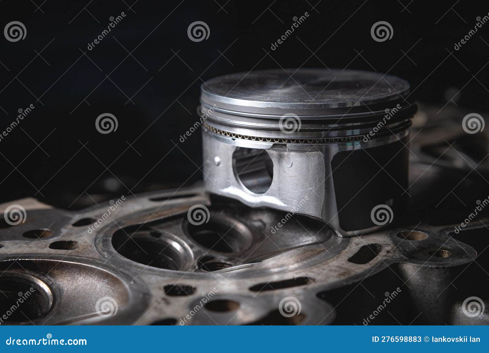 A New Repair Piston of the Internal Combustion Engine Lies on a ...