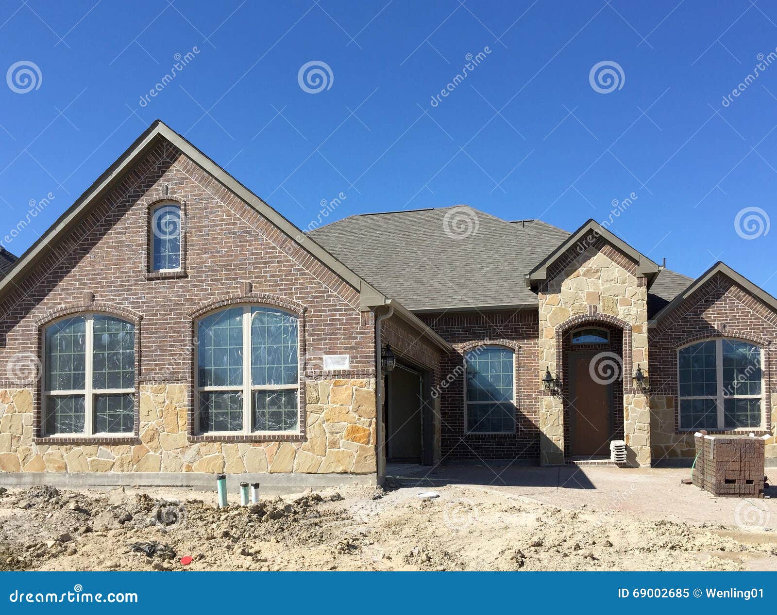 A New Rock and Brick House Under Construction Stock Image - Image of ...