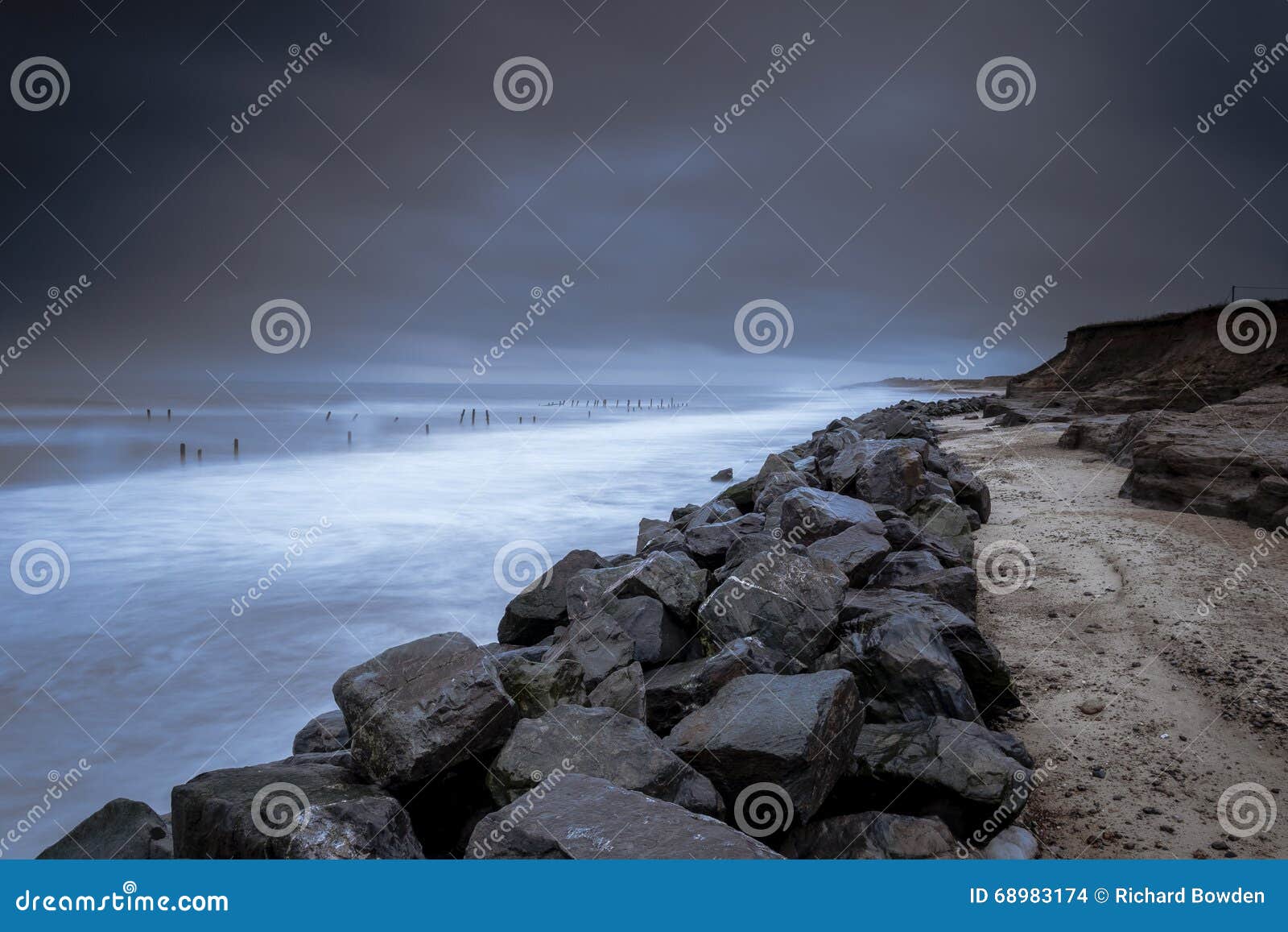 New Rock Wall stock photo. Image of britain, united, coast - 68983174