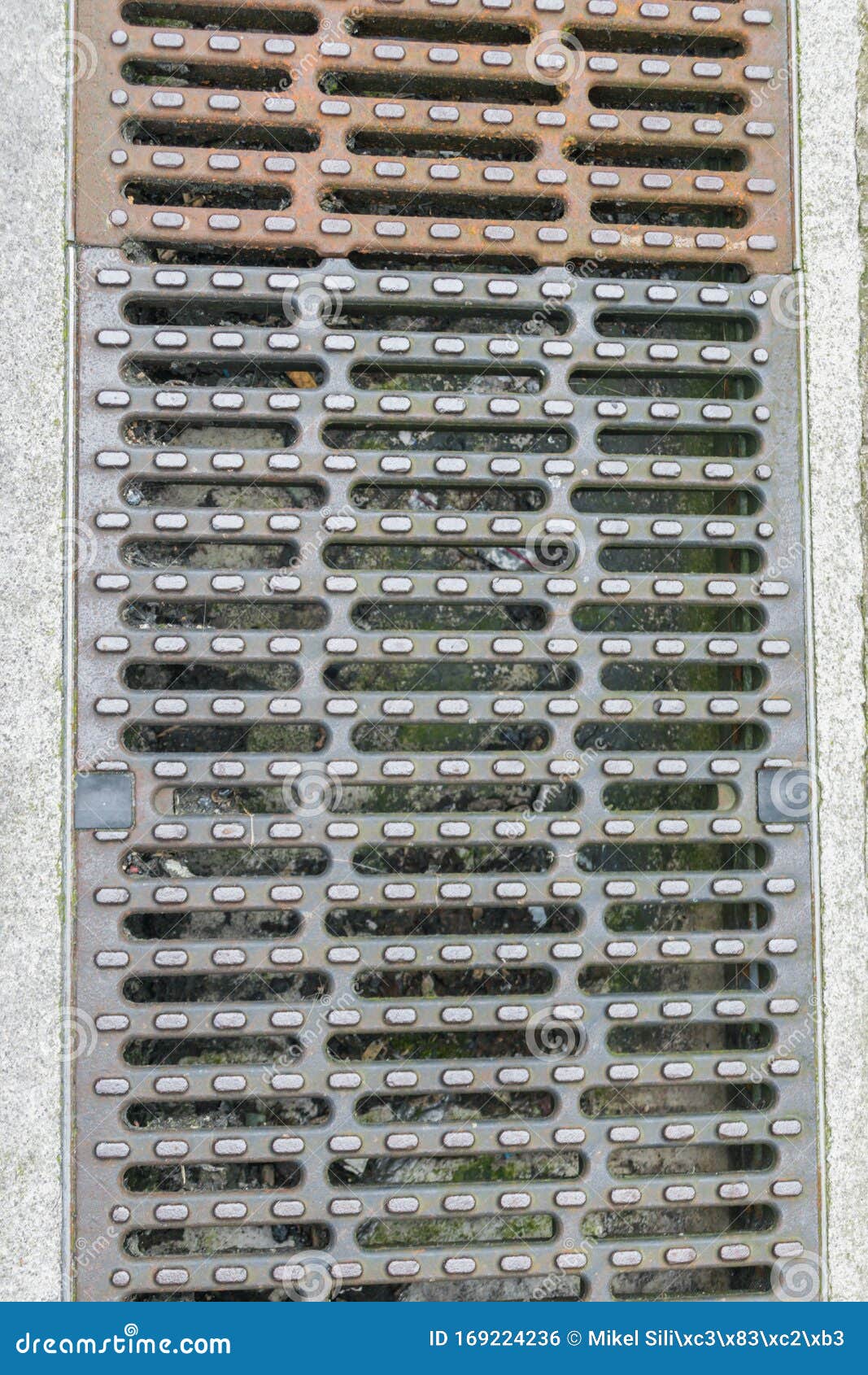 New Sewer Cover in the Street Stock Photo - Image of grid, natural ...