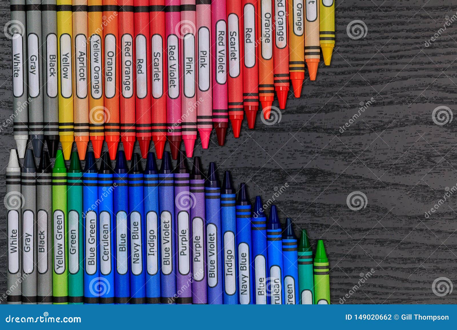 Crayons Arranged on a Grainy Wooden Board Stock Photo - Image of ...