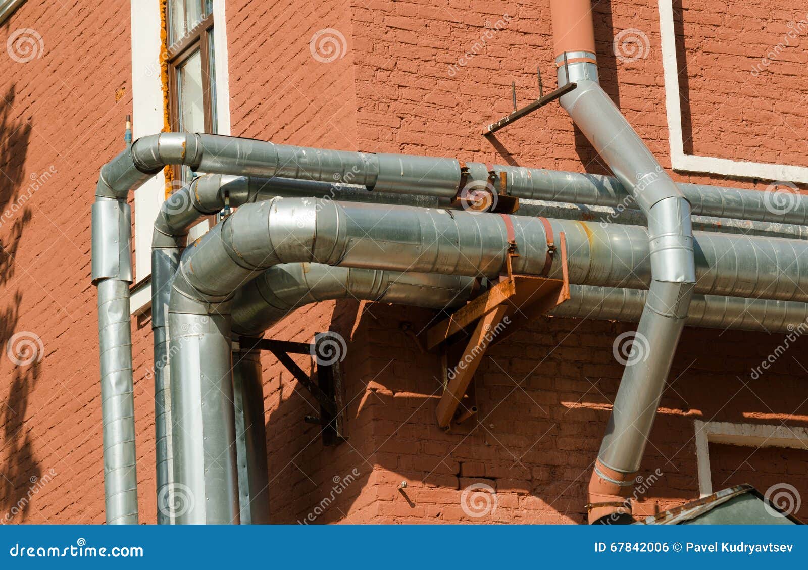 New Shiny Pipes Outside Facade of House Stock Photo - Image of ...