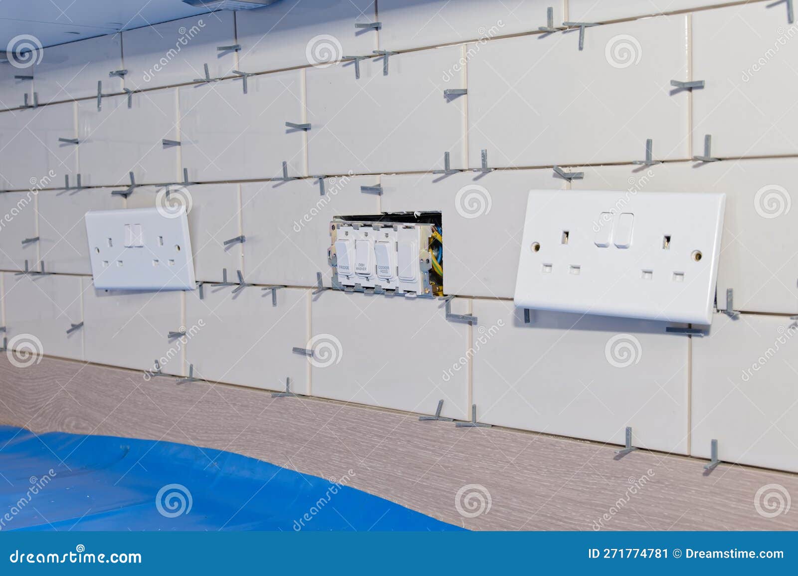 New Tile Installation in Kitchen with Electrical Sockets Removed Stock ...