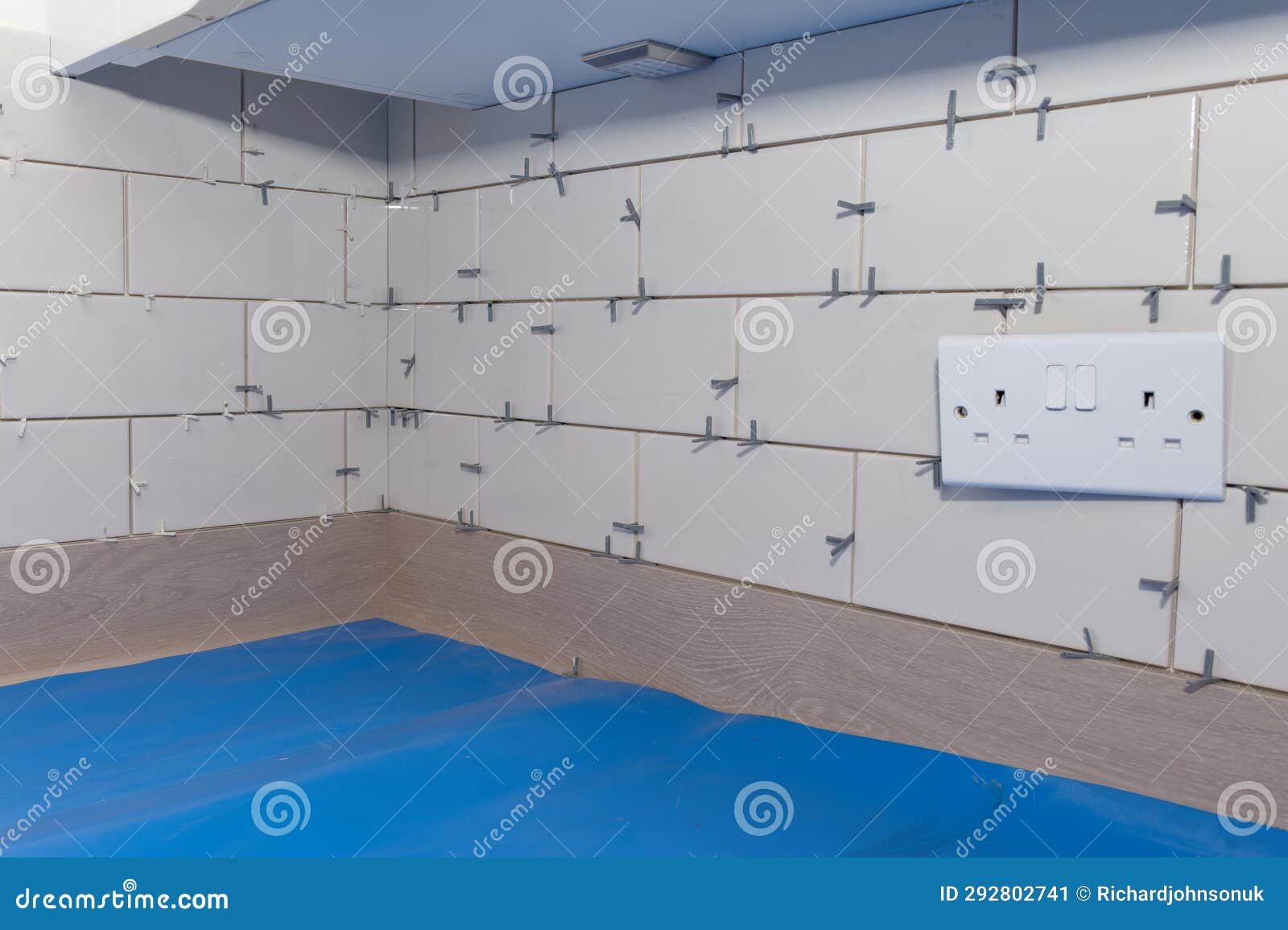 New Tile Installation in Kitchen with Electrical Sockets Removed Stock ...