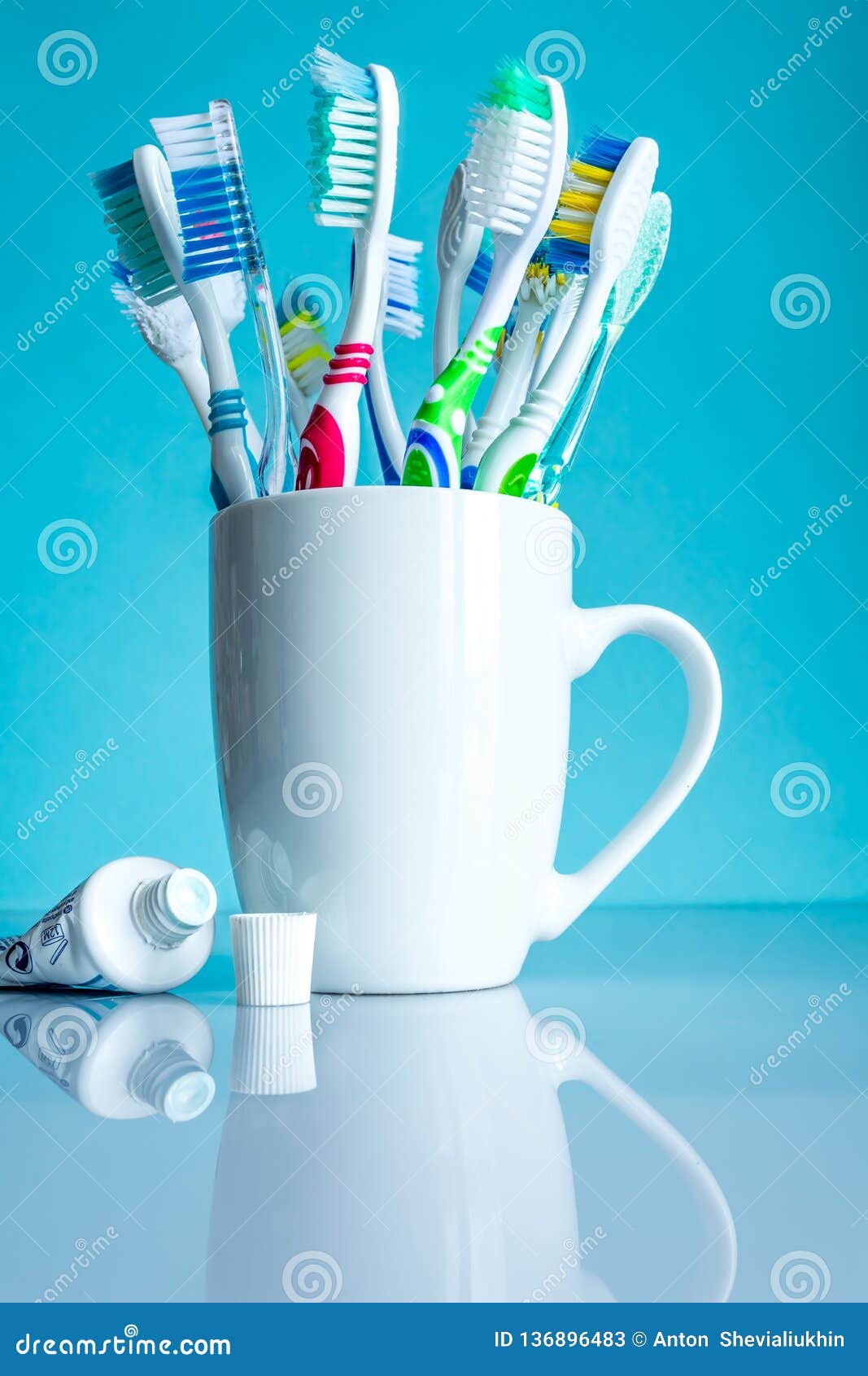 New Toothbrush with Toothpaste Close-up in the Bathroom on a Mirror ...