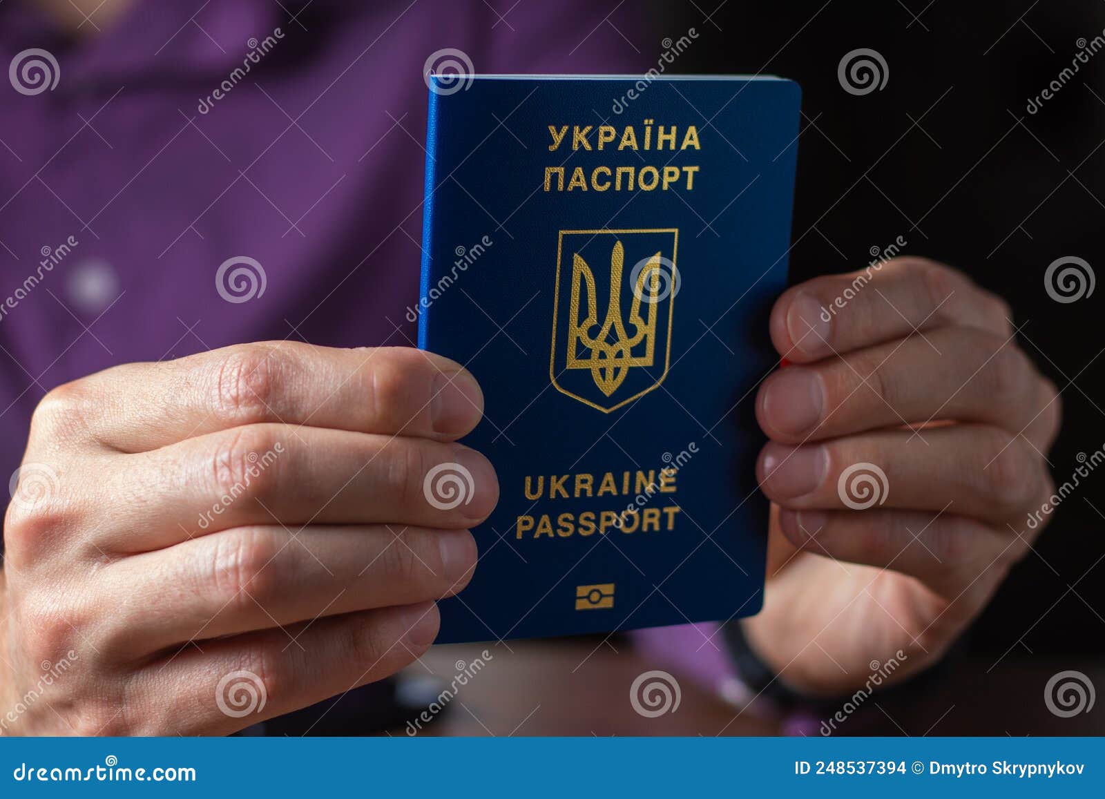 New Ukrainian Blue Biometric Passport with Identification Chip in Hands ... New Ukrainian Blue Biometric Passport with Identification Chip in Hands ...