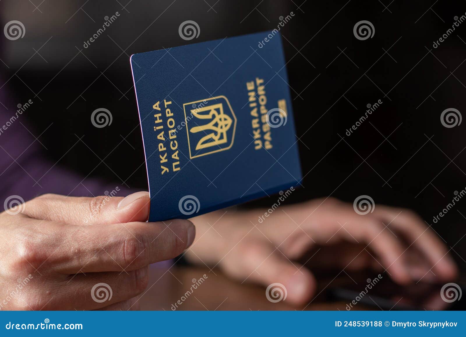 New Ukrainian Blue Biometric Passport with Identification Chip in Hands ... New Ukrainian Blue Biometric Passport with Identification Chip in Hands ...