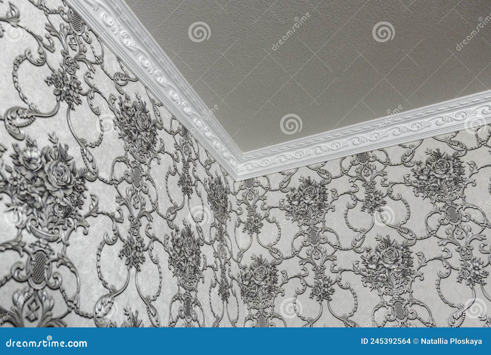 New Wallpaper and Baseboard on the Wall and Ceiling. Stock Photo ...